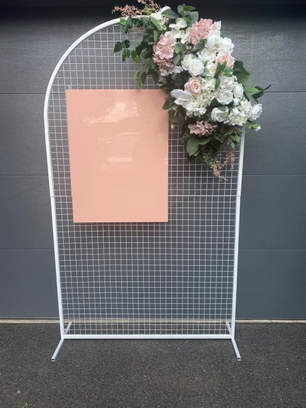 WHITE MESH ARCH BACKDROP WITH FAUX FLORALS | Styled Event Hire