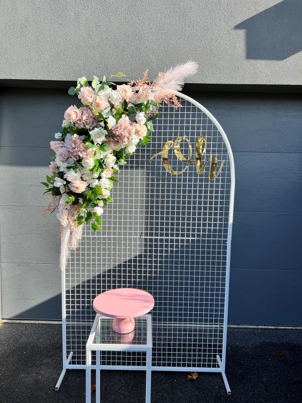 WHITE MESH ARCH BACKDROP WITH FAUX FLORALS | Styled Event Hire